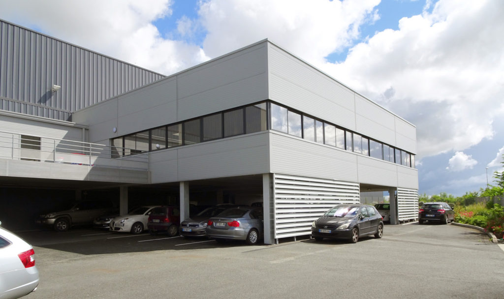 Extension de bâtiment de bureaux et modification de parkings | SRBI